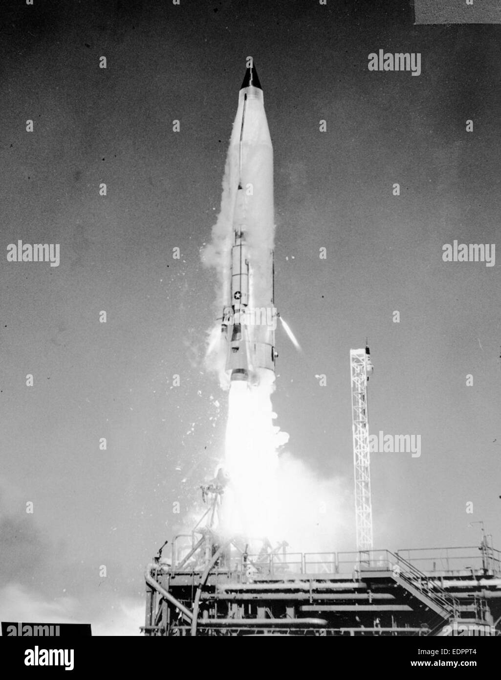 This image documents the launch of an Atlas ICBM, an early ...