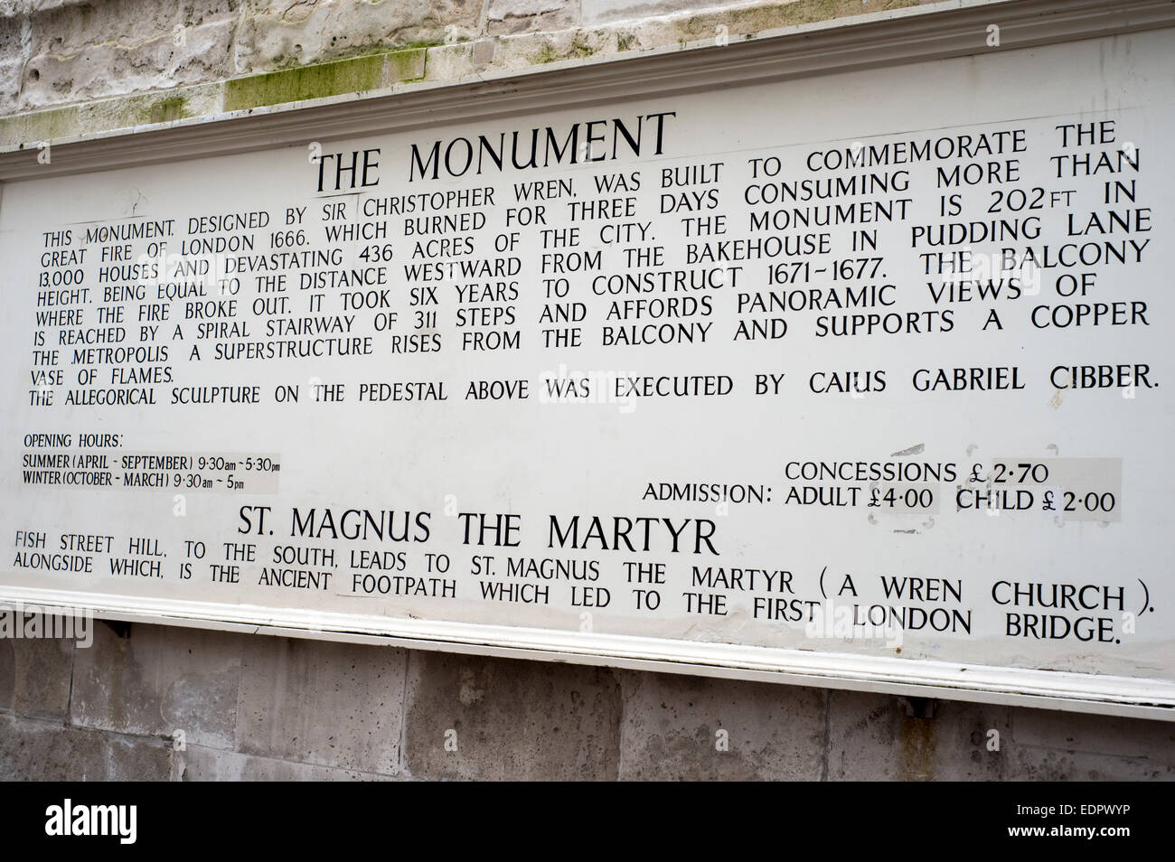 Sign at the base of the monument to the Great Fire of London, which is ...