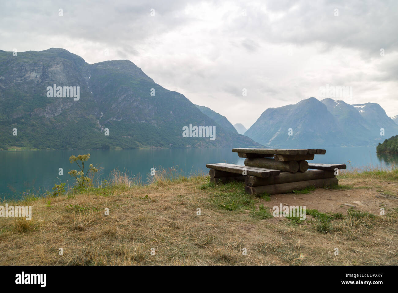 Wooden bench in a norwegian fjord Stock Photo - Alamy