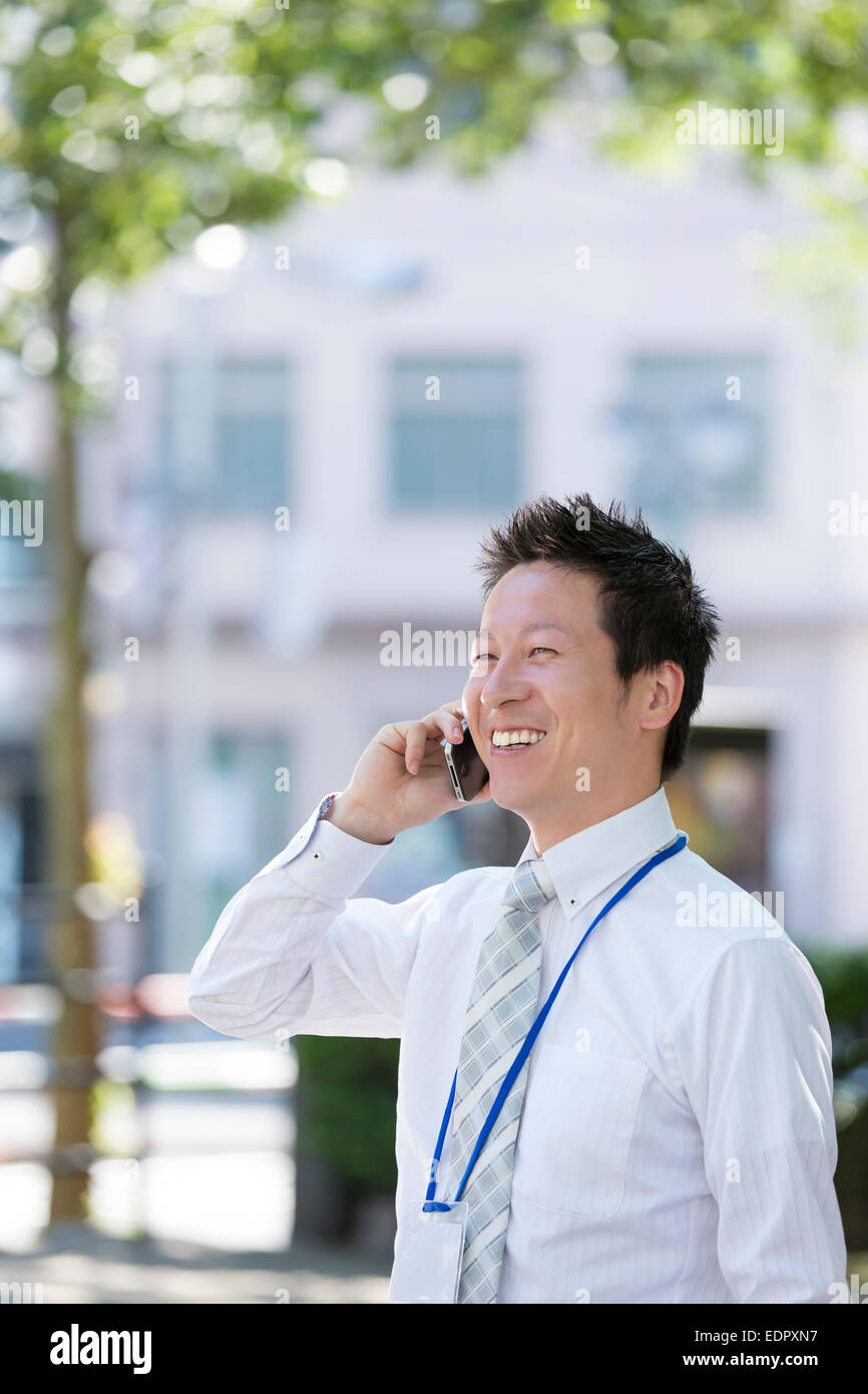 Talking on mobile phone hi-res stock photography and images - Alamy