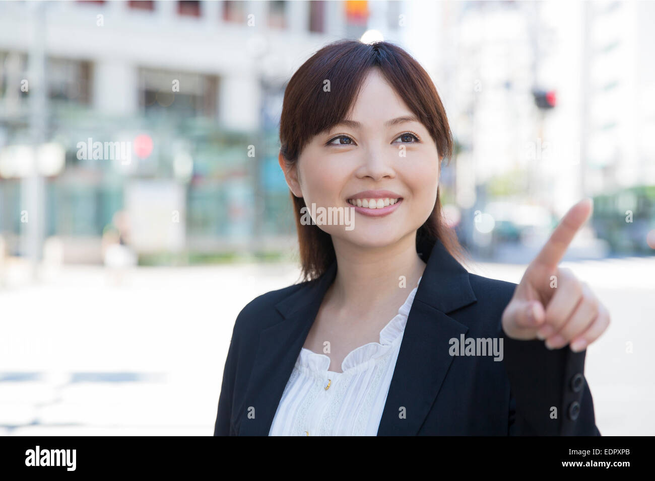 Japanese pointing finger hi-res stock photography and images - Alamy