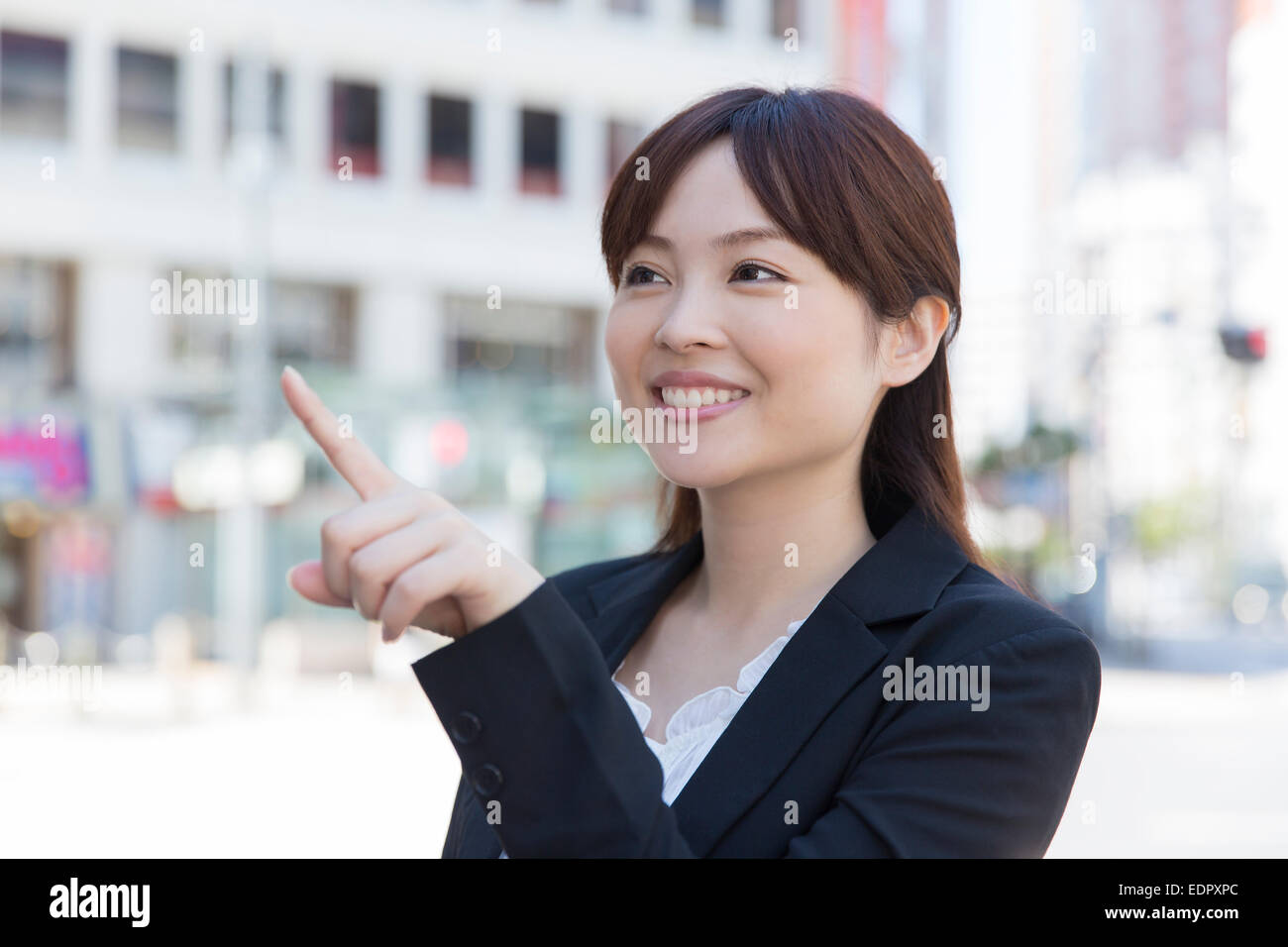 Japanese pointing finger hi-res stock photography and images - Alamy