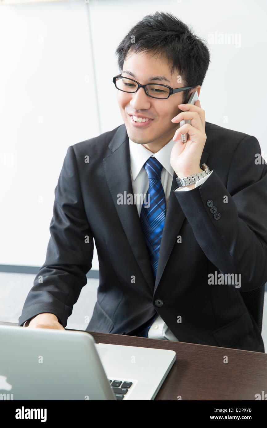 Businessman using computer phone hi-res stock photography and images ...