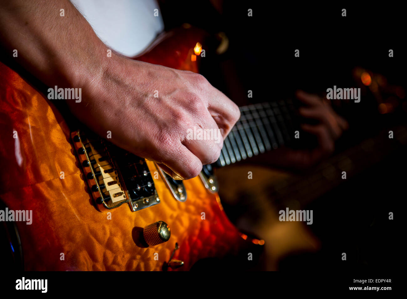 Playing the Electric Guitar in close up Stock Photo - Alamy