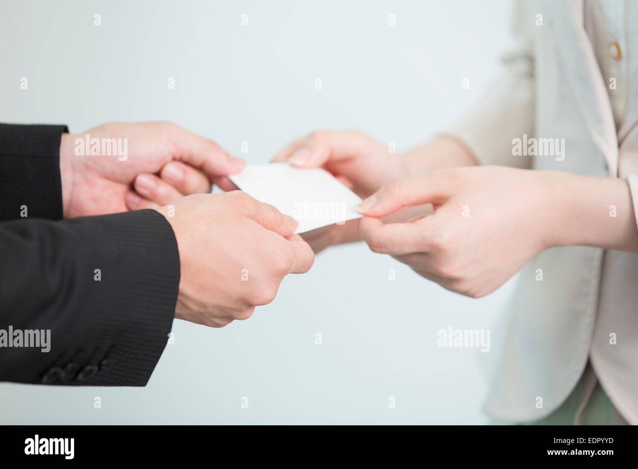Close up of Exchanging Business Cards Stock Photo - Alamy