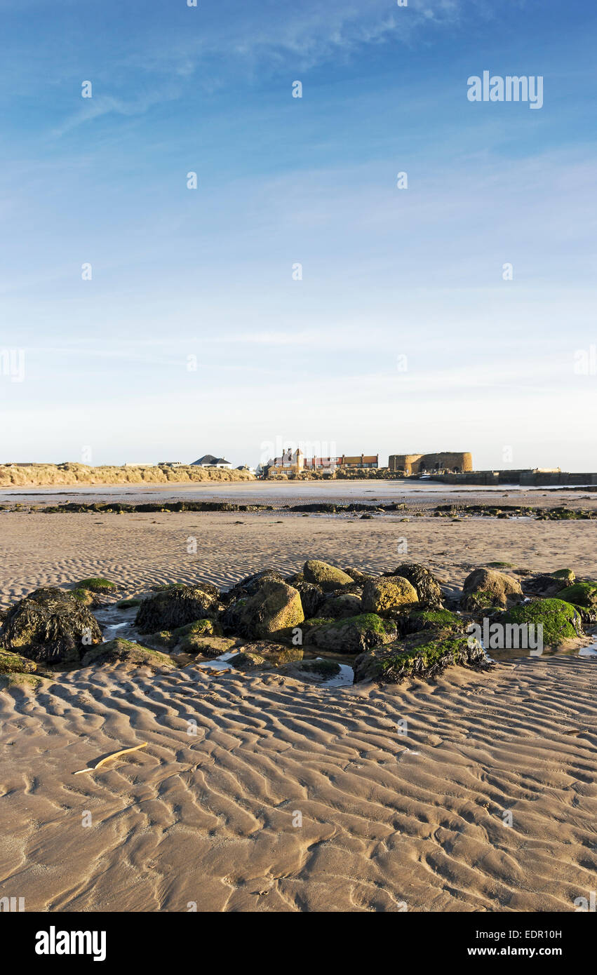 Looking from Beadnell Bay beach back towards Beadnell village and 18th ...