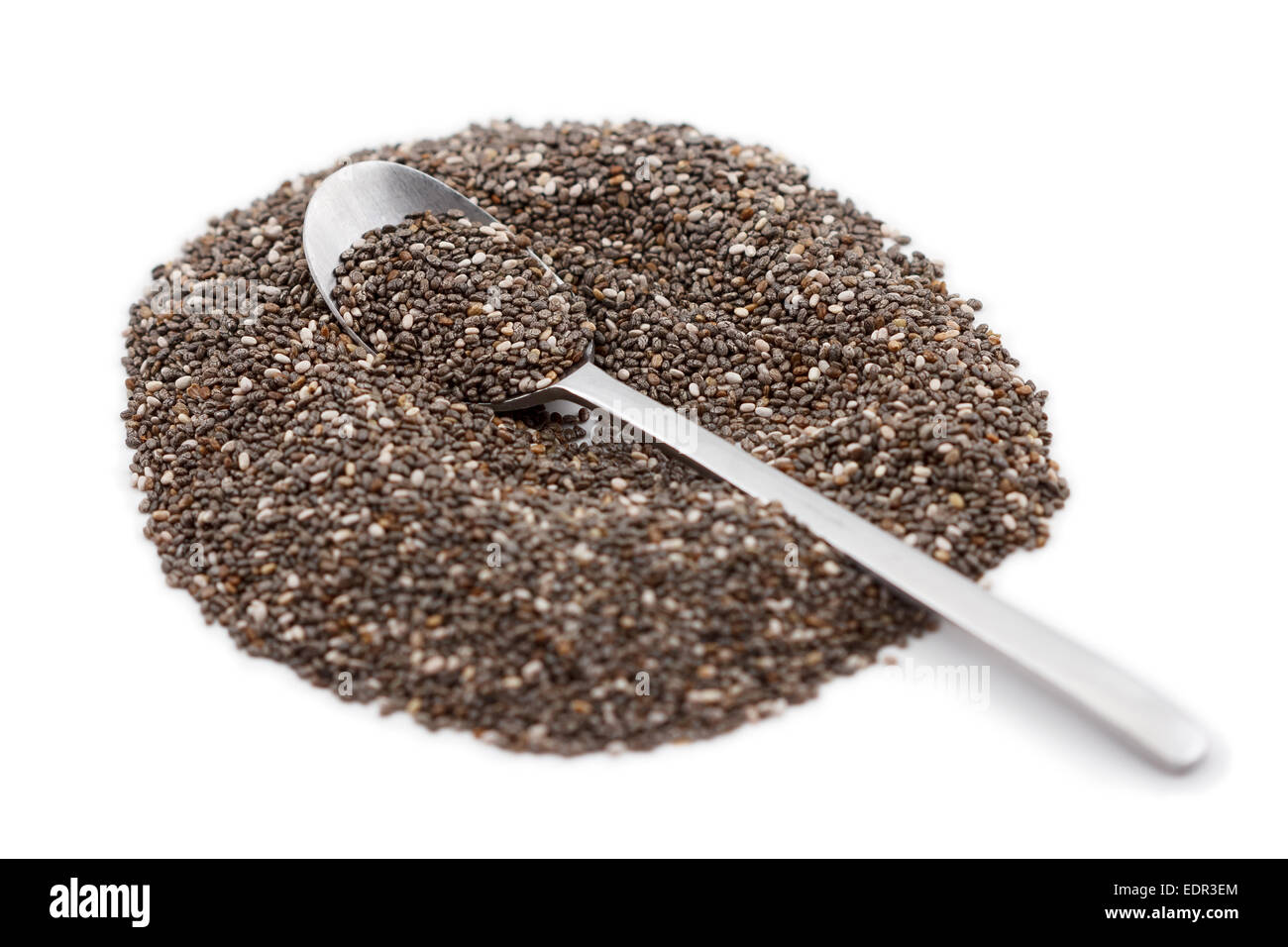 Heap of chia seeds and spoon on white Stock Photo - Alamy