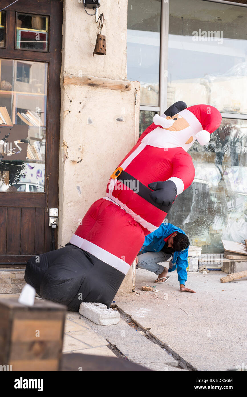An inflatable Santa Claus in Aqaba, Jordan Stock Photo - Alamy