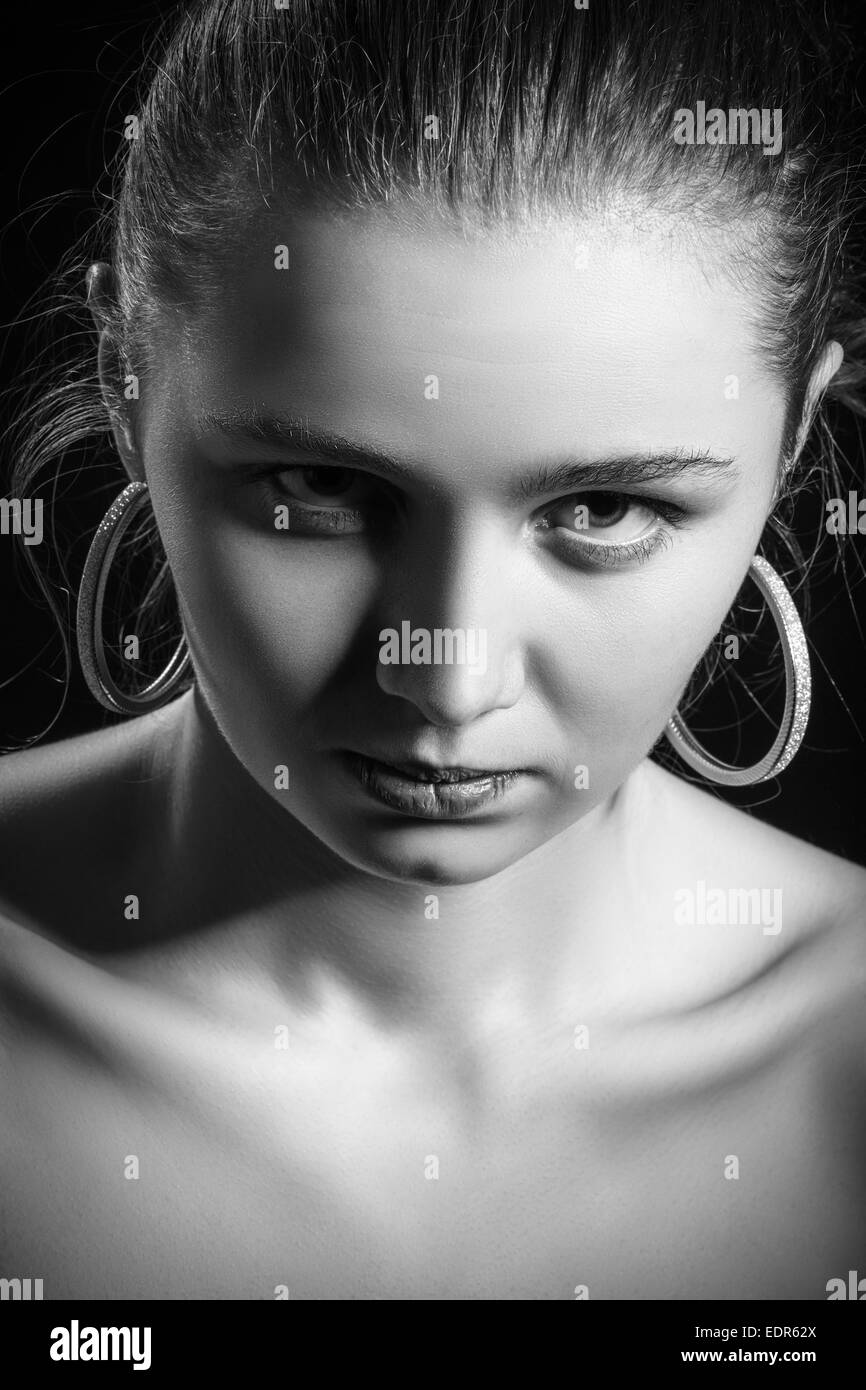 serious angry girl face looking at camera, monochrome image Stock Photo ...
