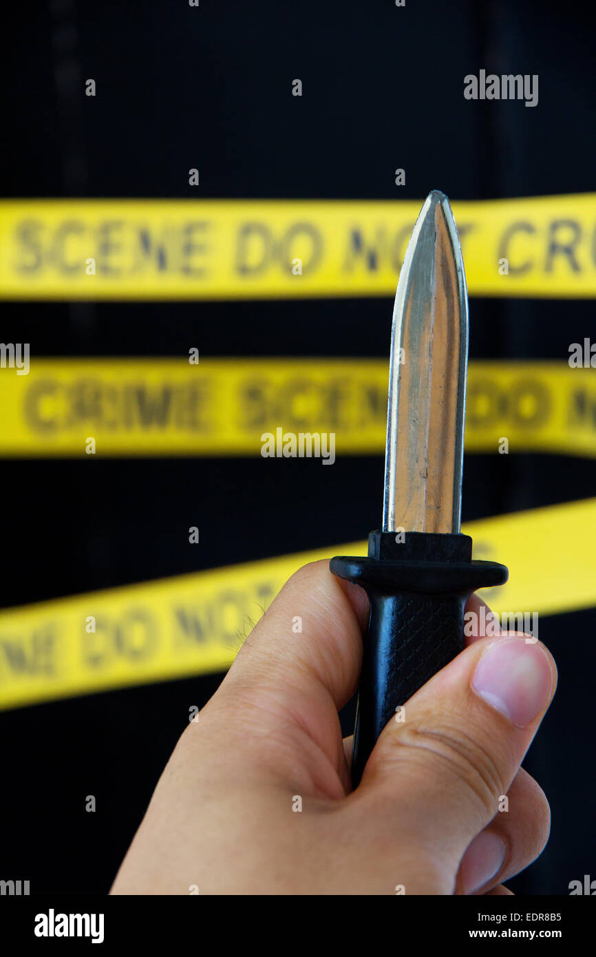 Crime scene tape hand hi-res stock photography and images - Alamy