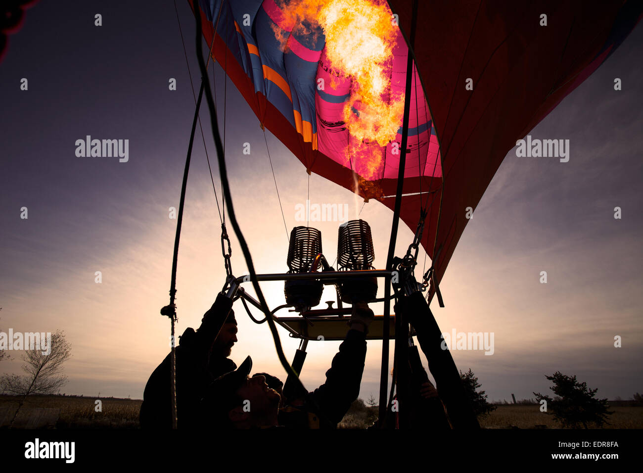 Hot air balloon getting ready for lift up Stock Photo - Alamy