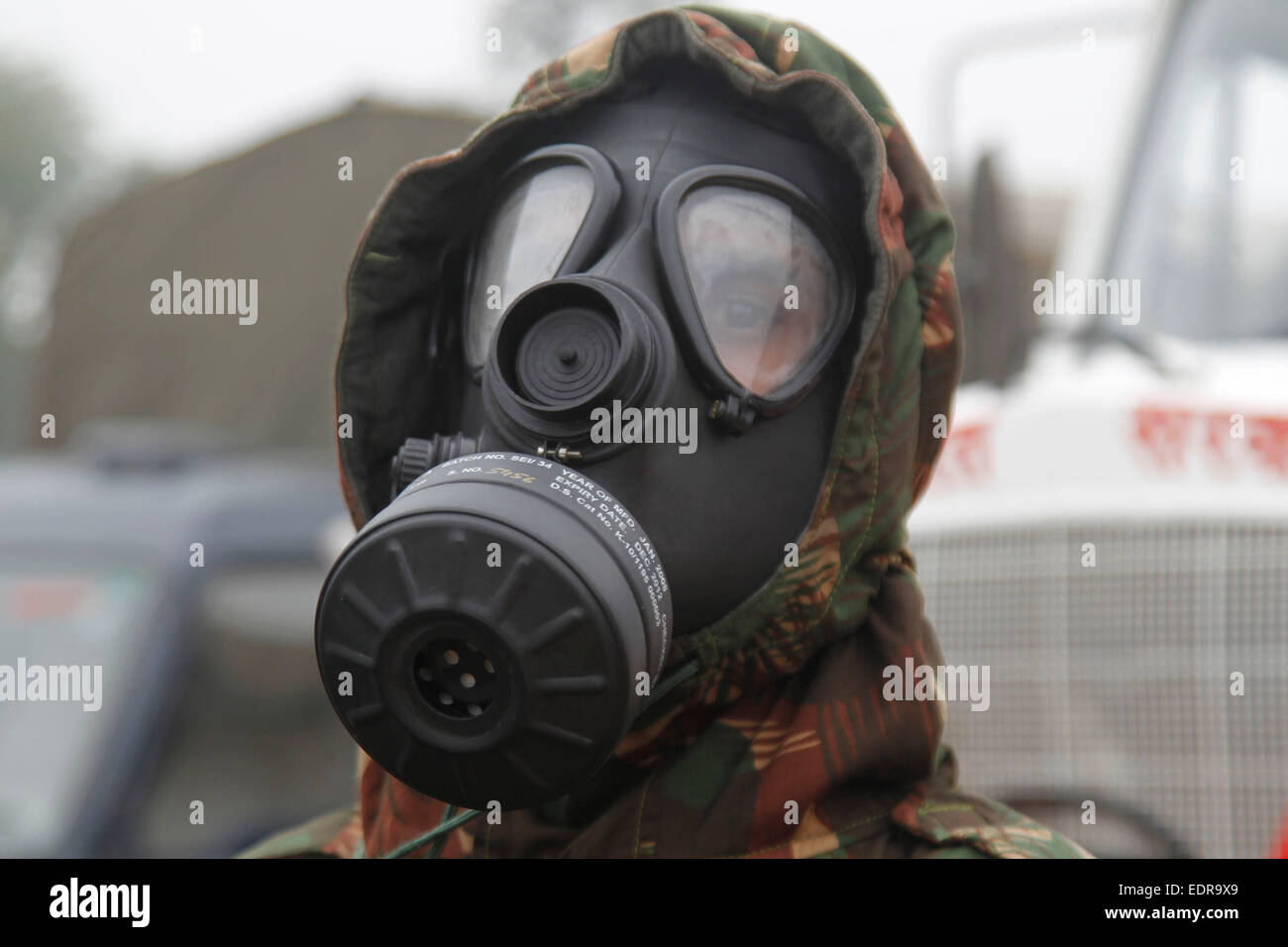 Fire fighting commando wears mask during mock drill during the month ...