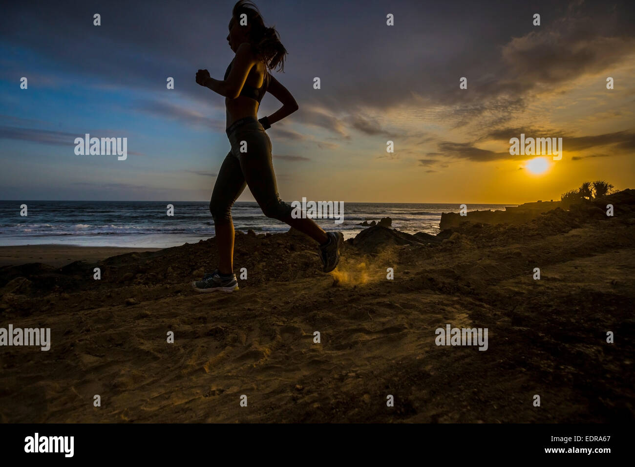 Running on the beach in Bali, Indonesia Stock Photo - Alamy