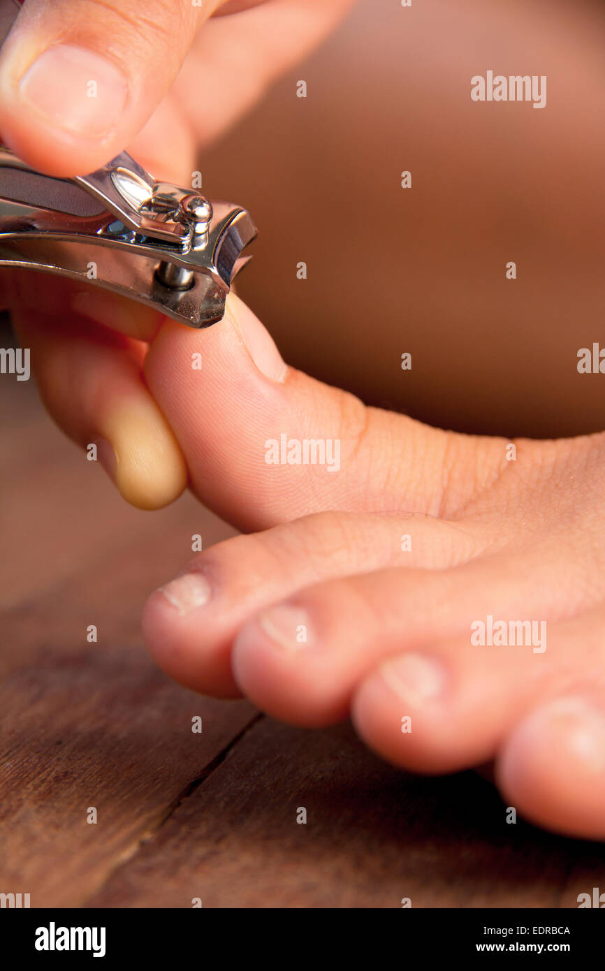 cutting your toenails Stock Photo - Alamy