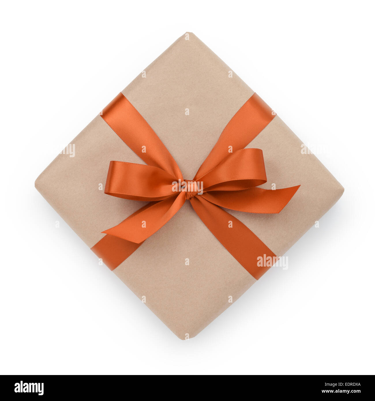 wrapped brown present box with orange ribbon bow, isolated on white ...