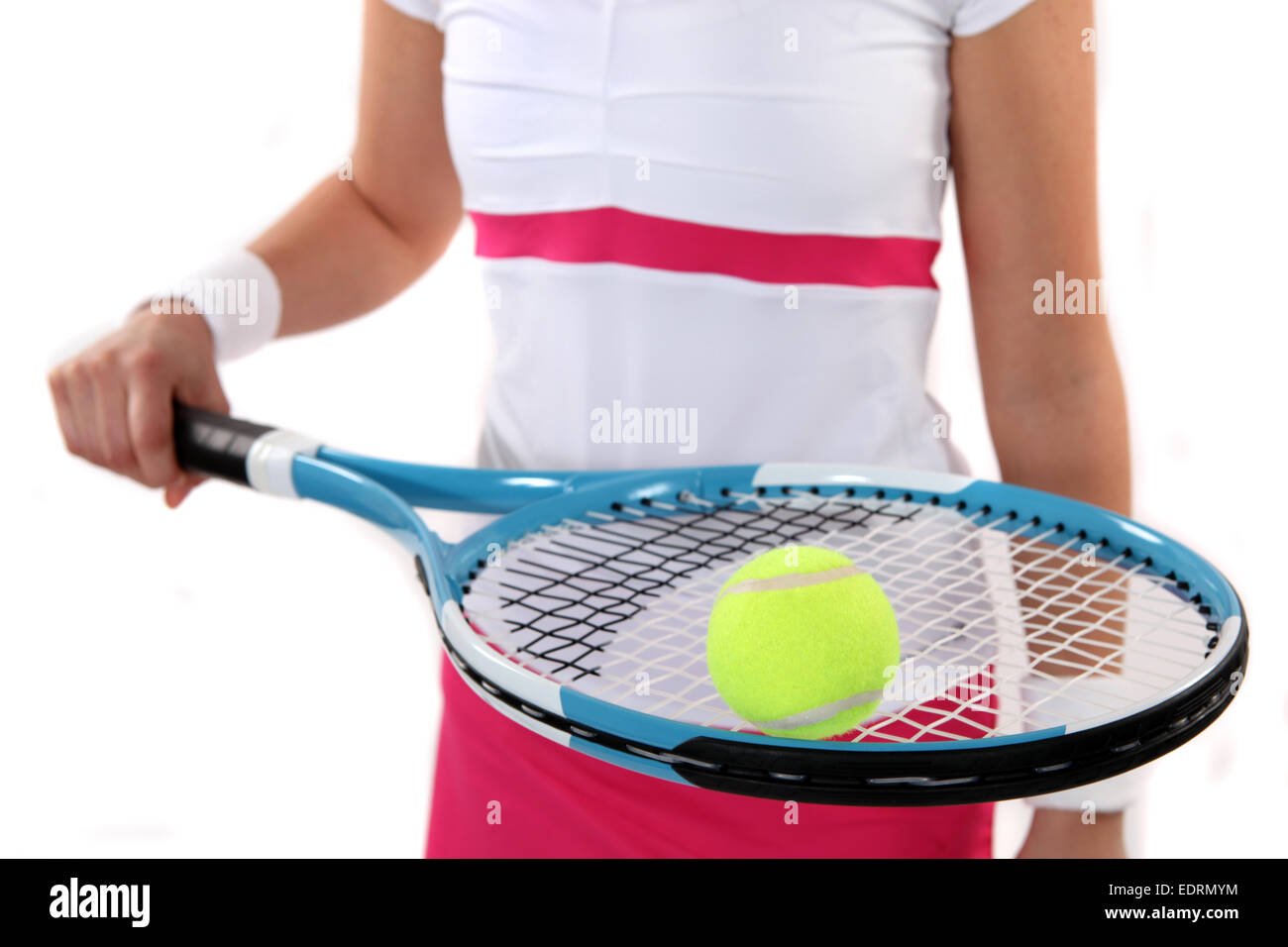 Tennis player holding her racket and ball Stock Photo - Alamy