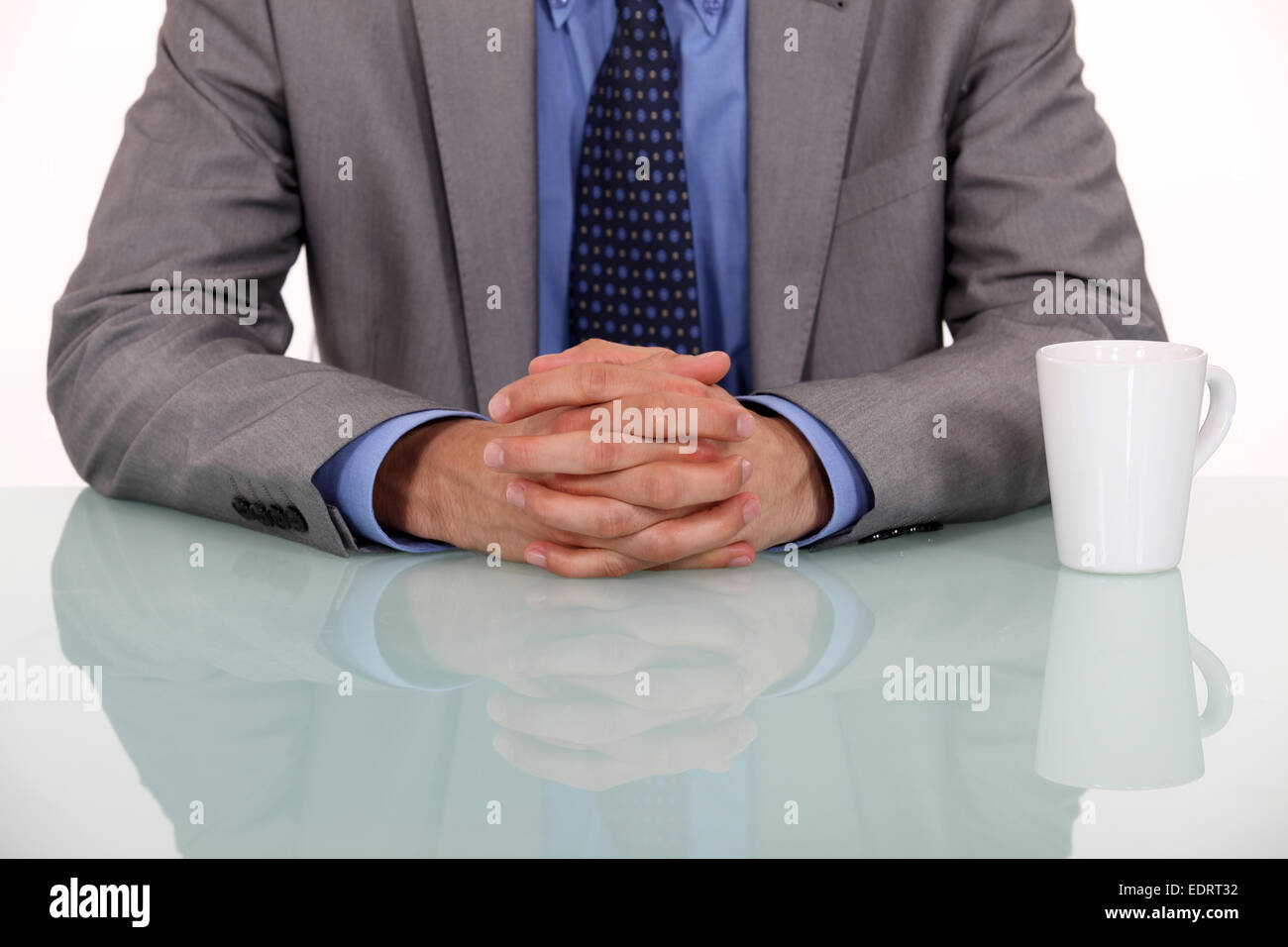 businessman crossing hands Stock Photo - Alamy