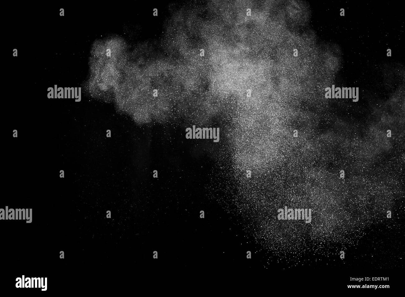 abstract white powder explosion on black background Stock Photo - Alamy
