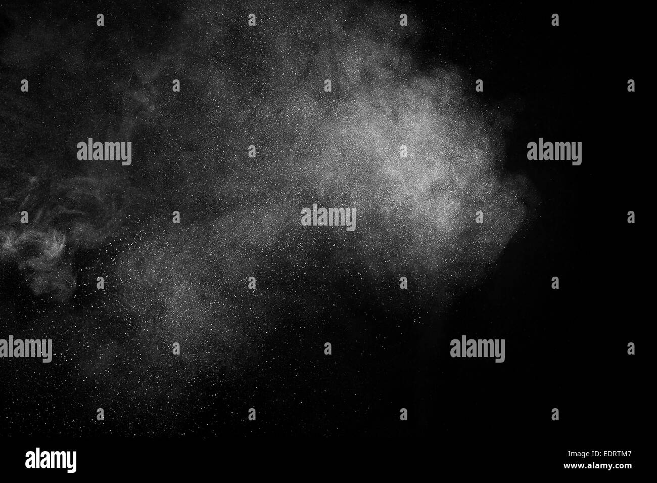 abstract white powder explosion on black background Stock Photo - Alamy