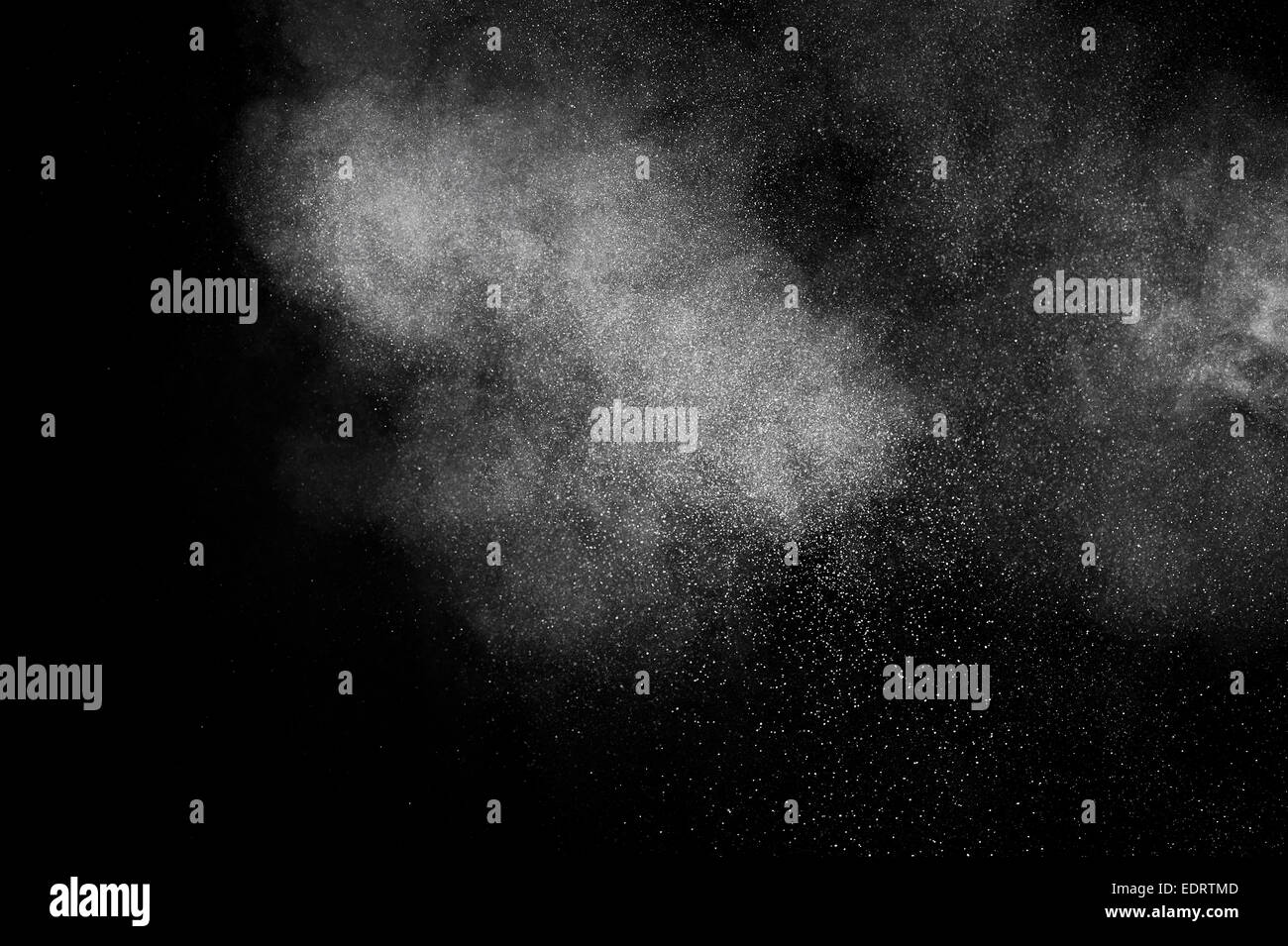 abstract white powder explosion on black background Stock Photo - Alamy
