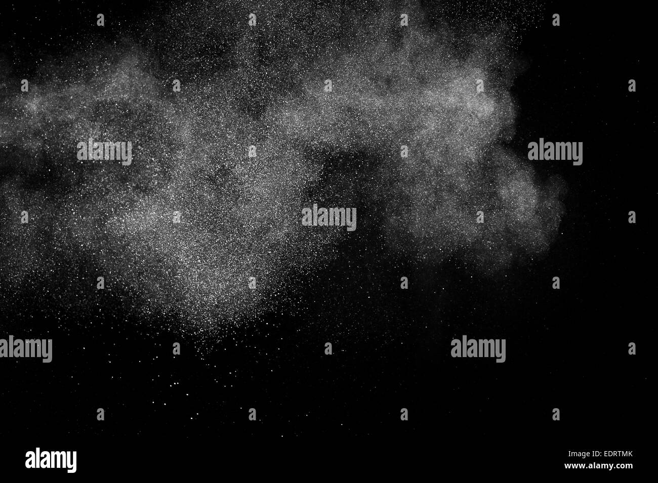 abstract white powder explosion on black background Stock Photo - Alamy