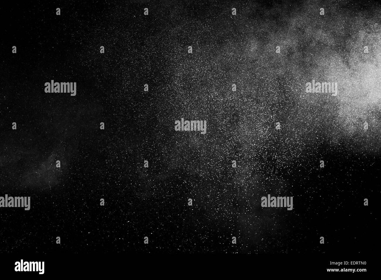 abstract white powder explosion on black background Stock Photo - Alamy