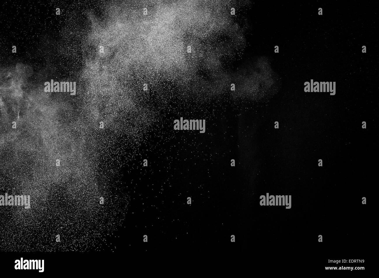 abstract white powder explosion on black background Stock Photo - Alamy
