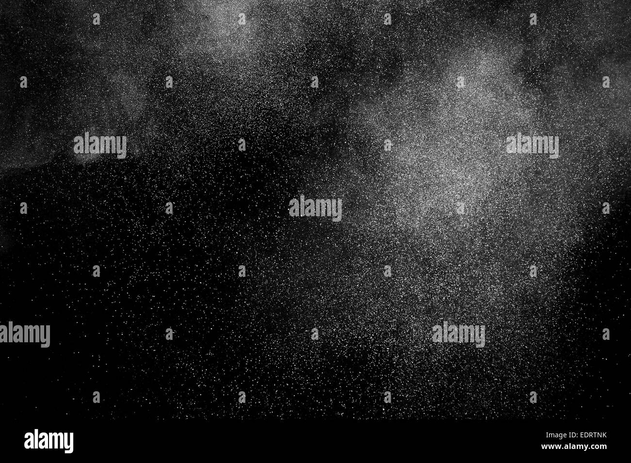 abstract white powder explosion on black background Stock Photo - Alamy