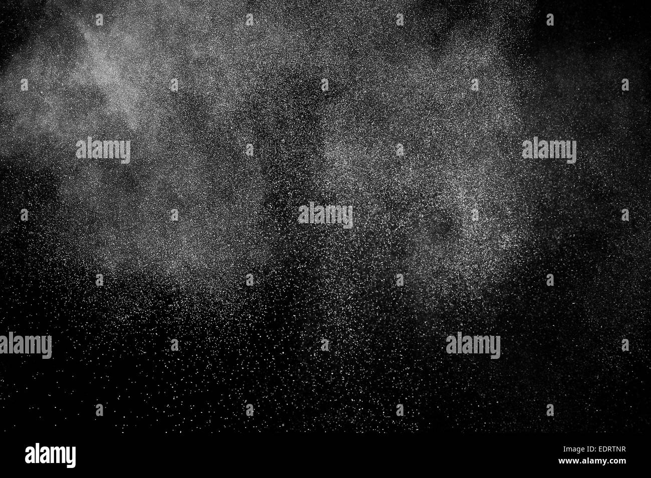 abstract white powder explosion on black background Stock Photo - Alamy