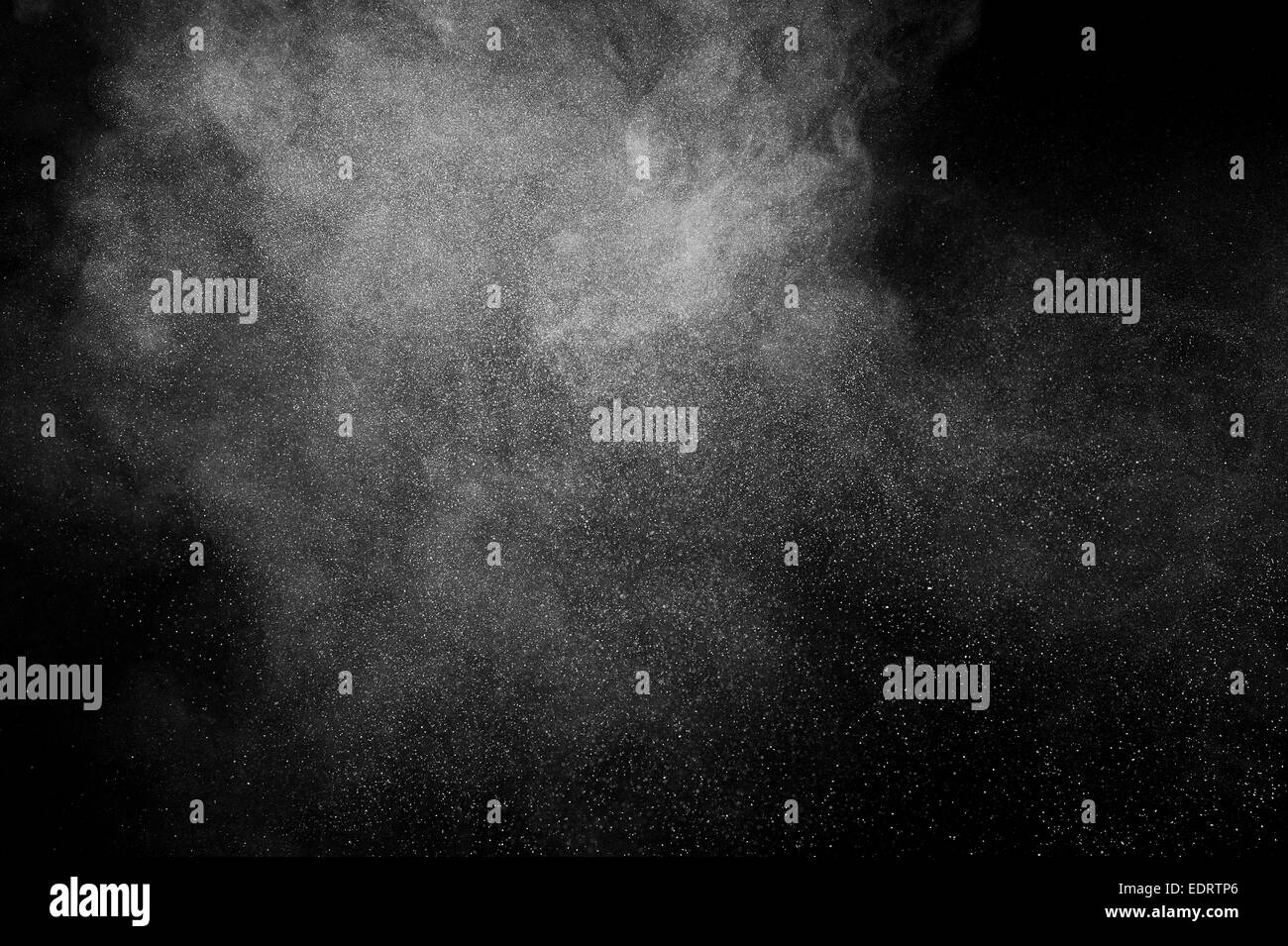 abstract white powder explosion on black background Stock Photo - Alamy