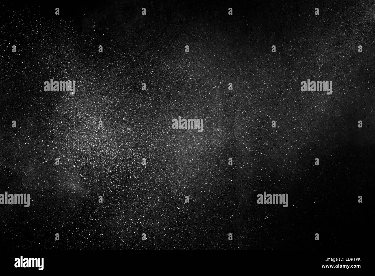 abstract white powder explosion on black background Stock Photo - Alamy