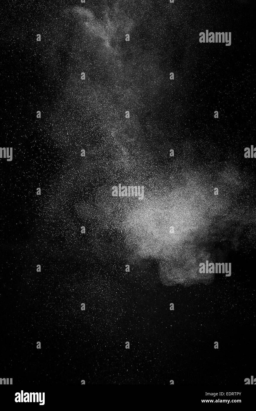 abstract white powder explosion on black background Stock Photo - Alamy