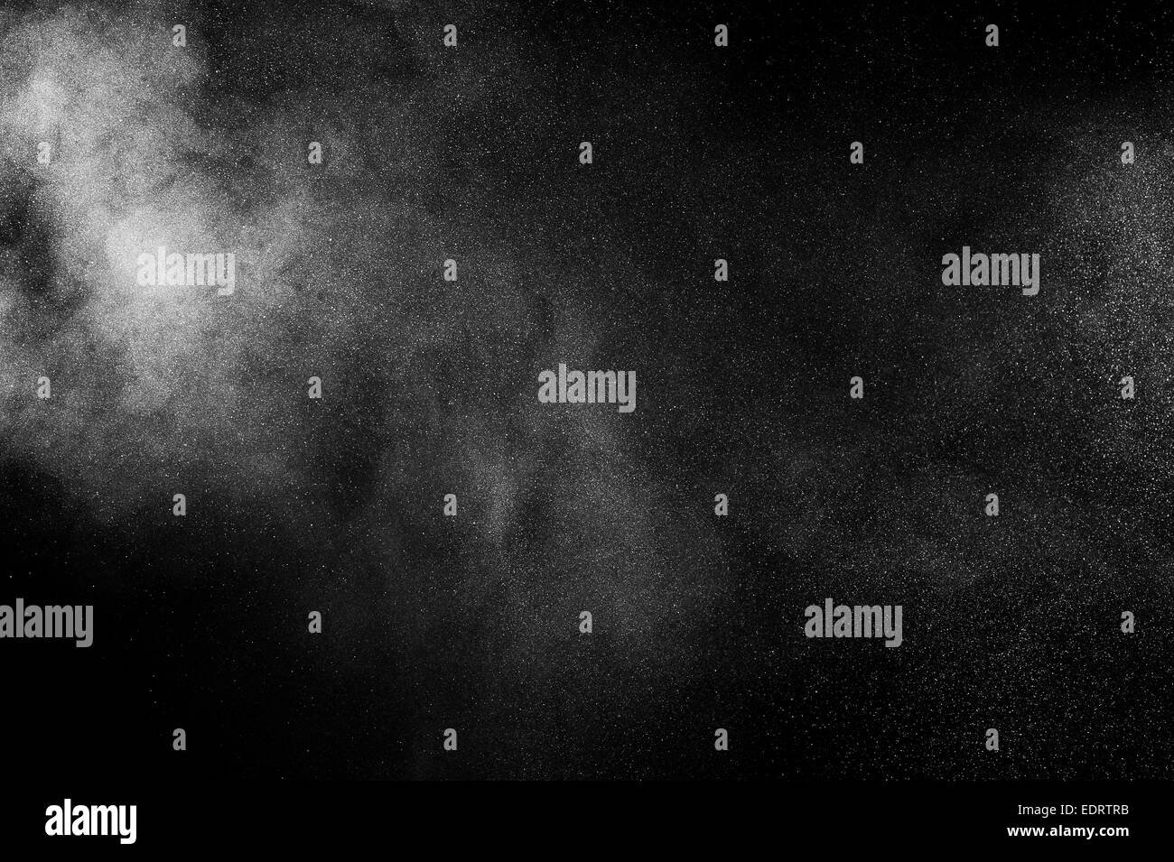 abstract white powder explosion on black background Stock Photo - Alamy