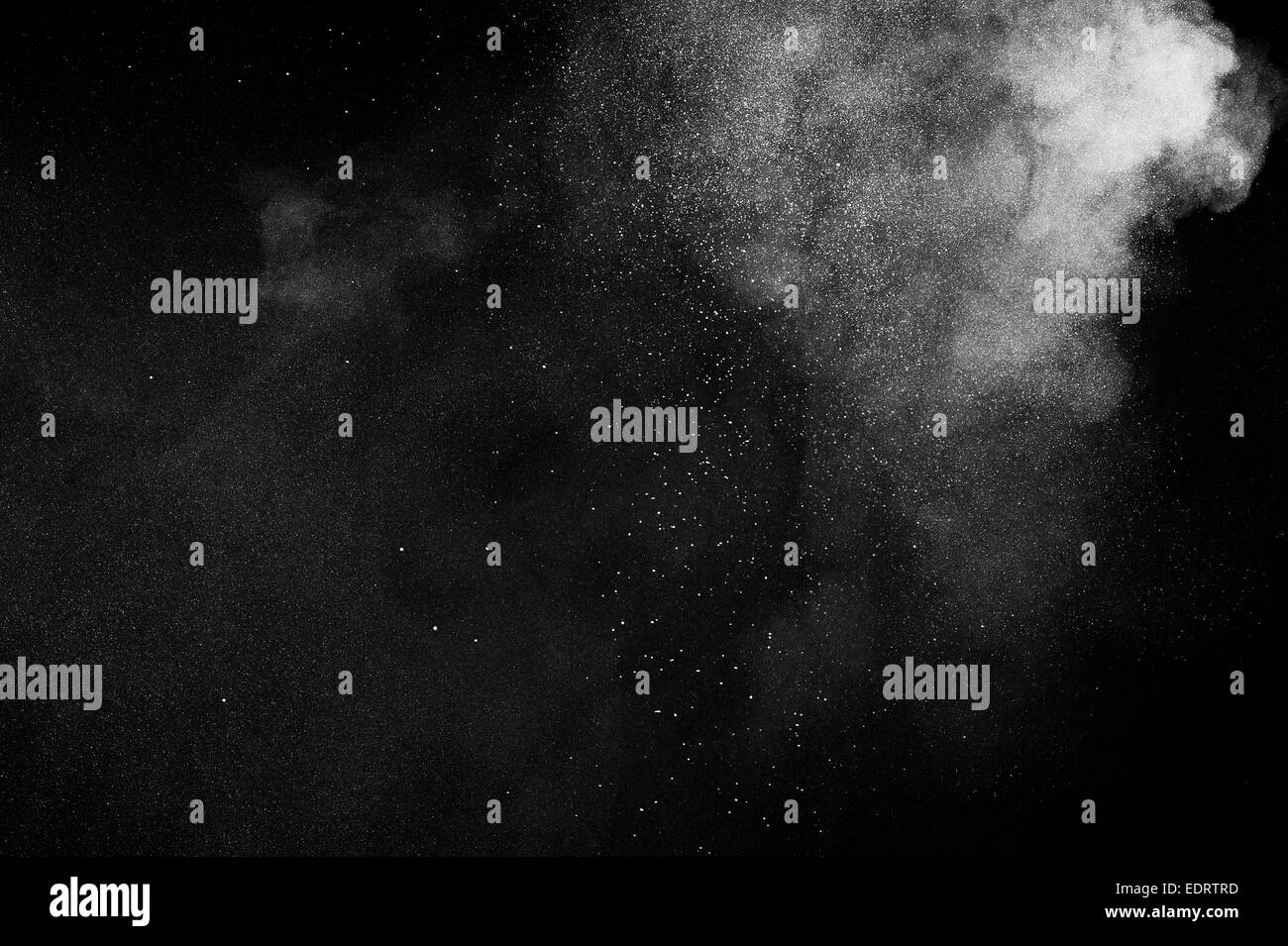 abstract white powder explosion on black background Stock Photo - Alamy