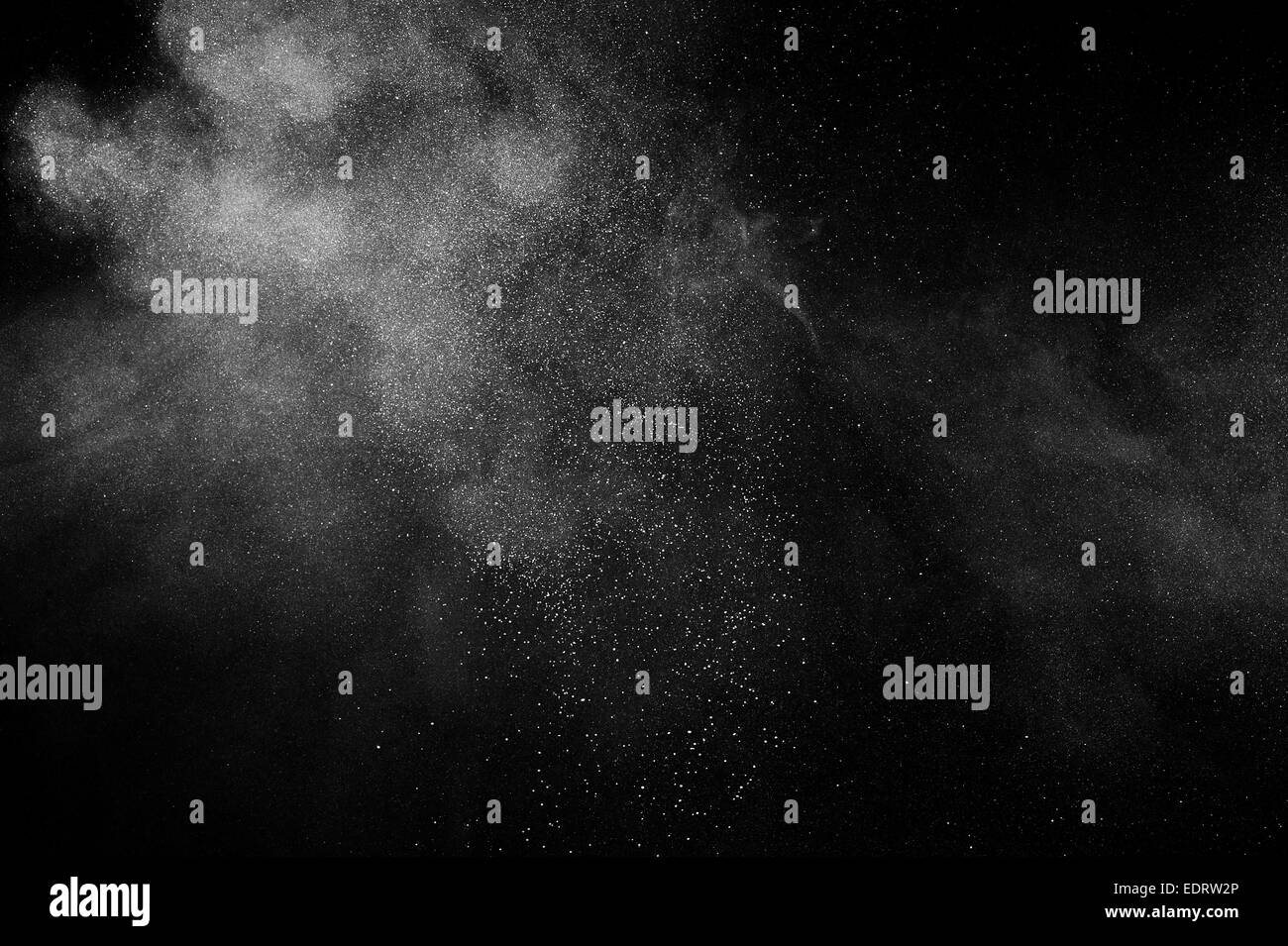 abstract white powder explosion on black background Stock Photo - Alamy