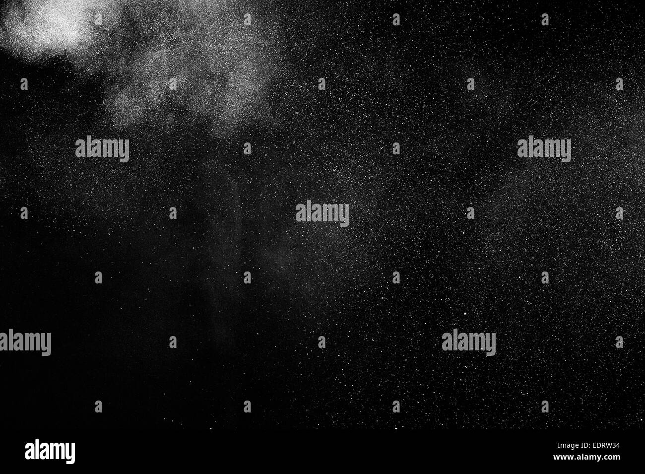abstract white powder explosion on black background Stock Photo - Alamy
