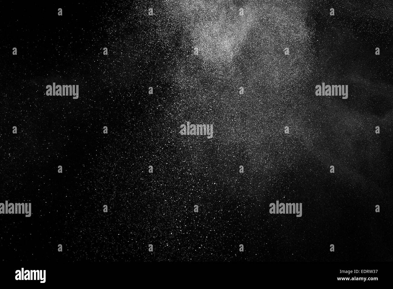abstract white powder explosion on black background Stock Photo - Alamy
