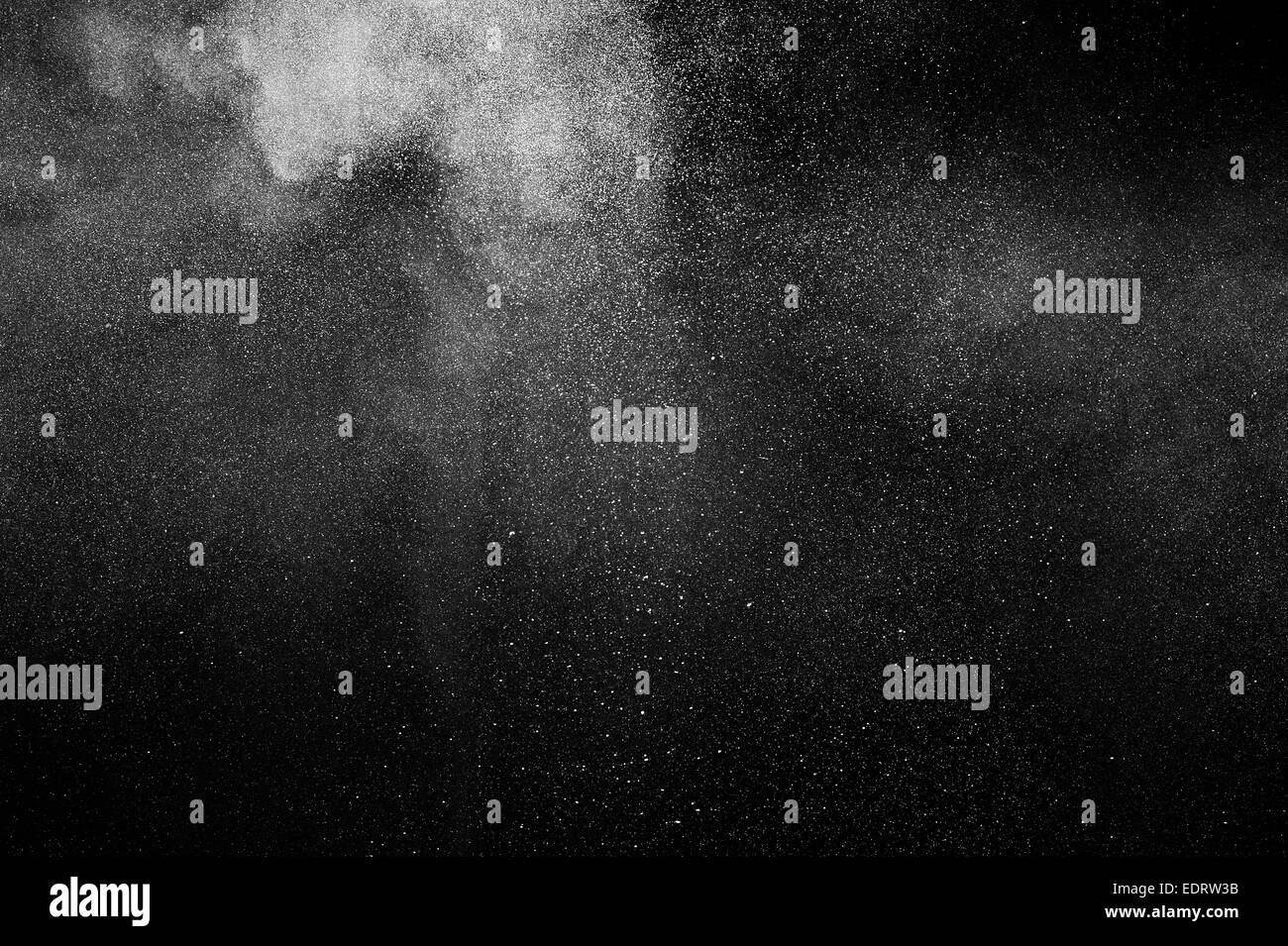 abstract white powder explosion on black background Stock Photo - Alamy