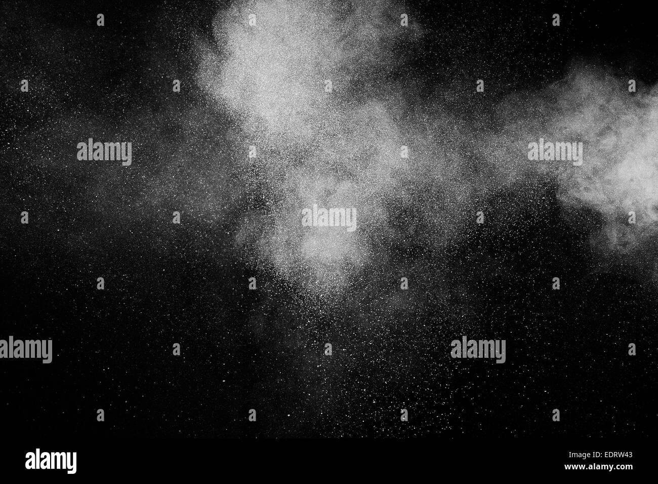 abstract white powder explosion on black background Stock Photo - Alamy