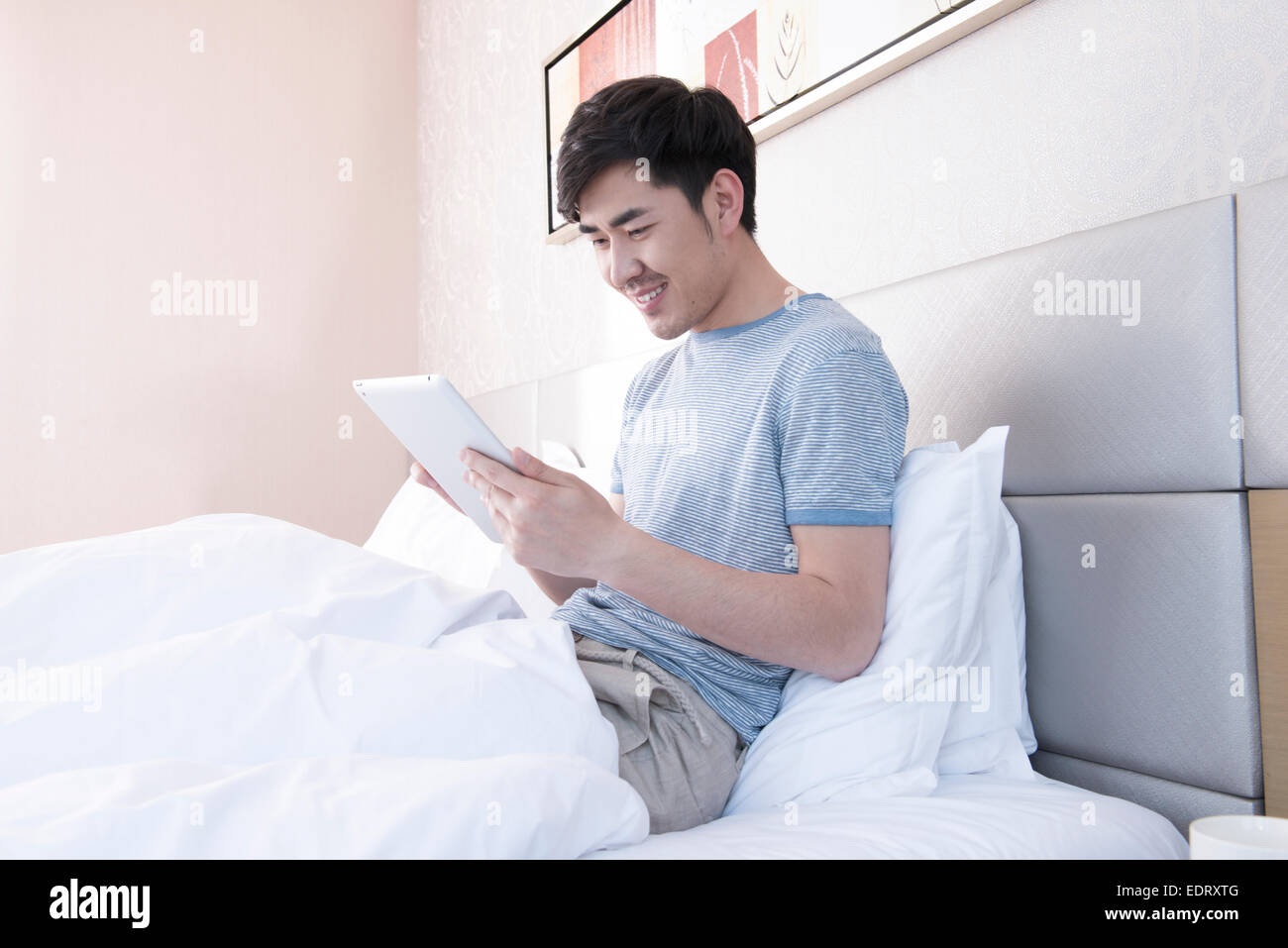 Young tablet images hi-res stock photography and images - Alamy