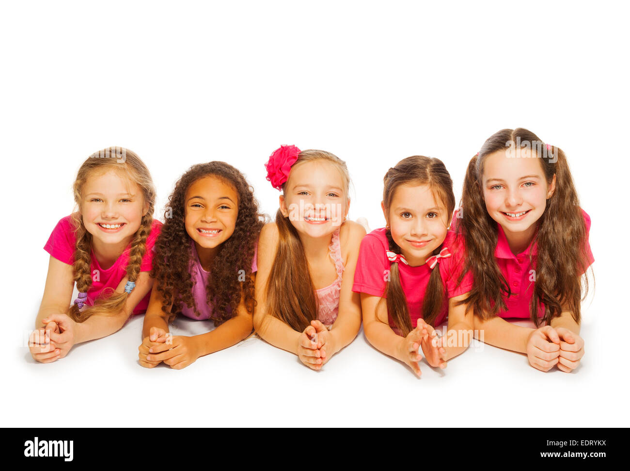 Isolated small girls laying on white background Stock Photo - Alamy