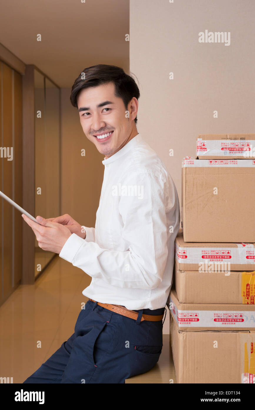 Online seller with boxes for shipping Stock Photo - Alamy