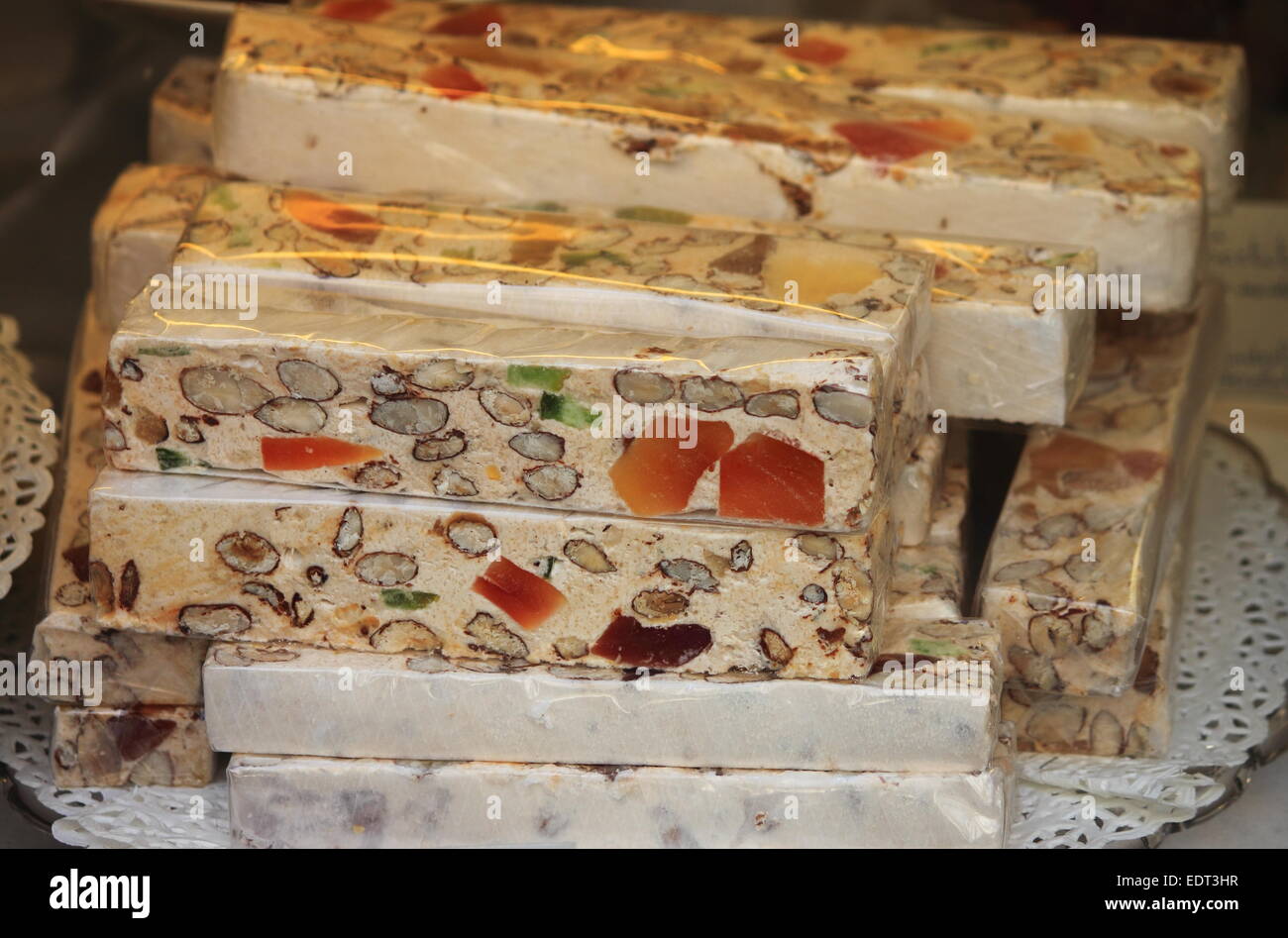 Blocks of almonds nougat for displayed in a patisserie Stock Photo - Alamy