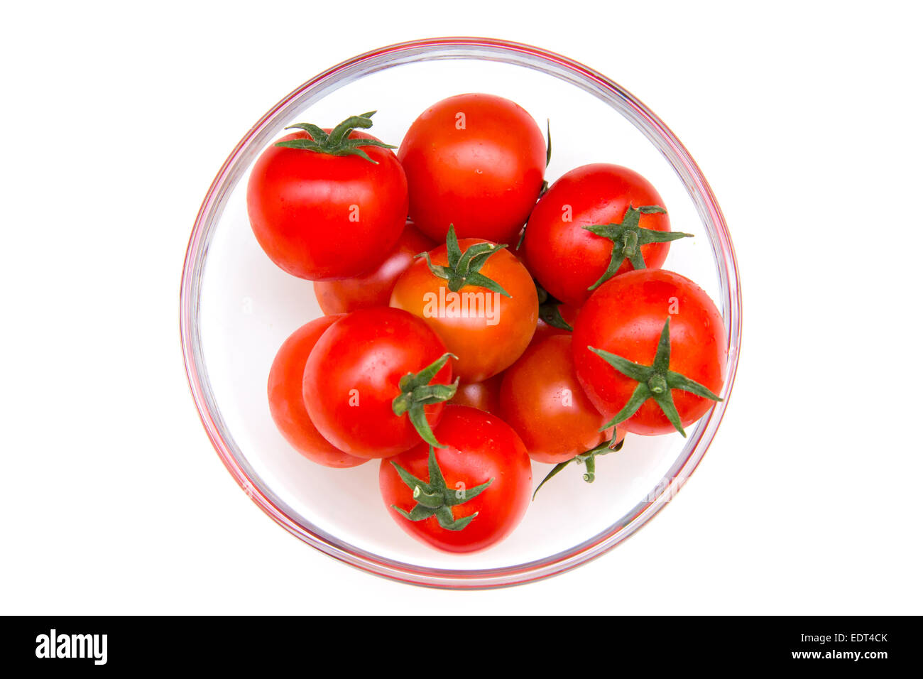Tomato on bowl on white background seen from above Stock Photo - Alamy