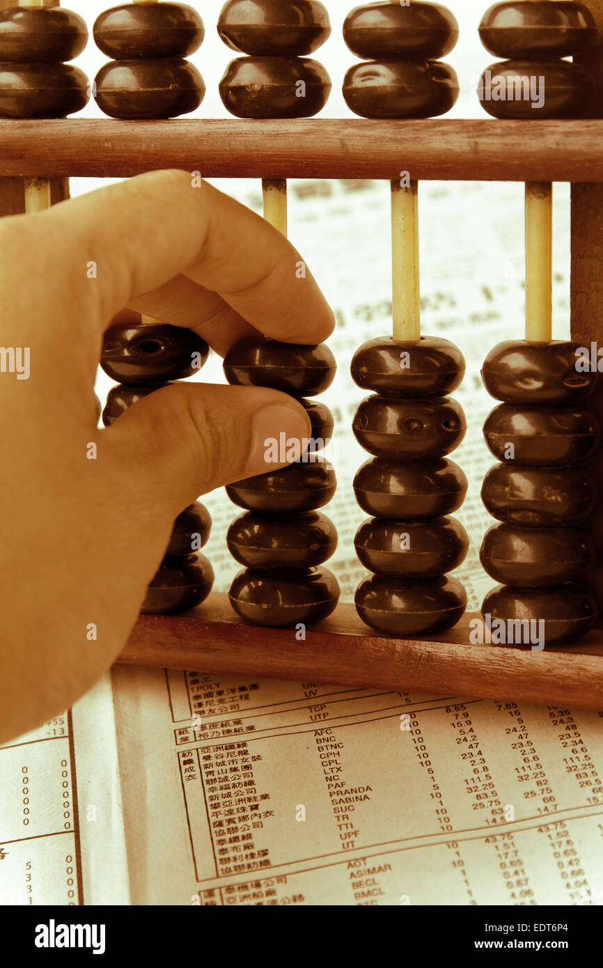 hand hold abacus Stock Photo - Alamy