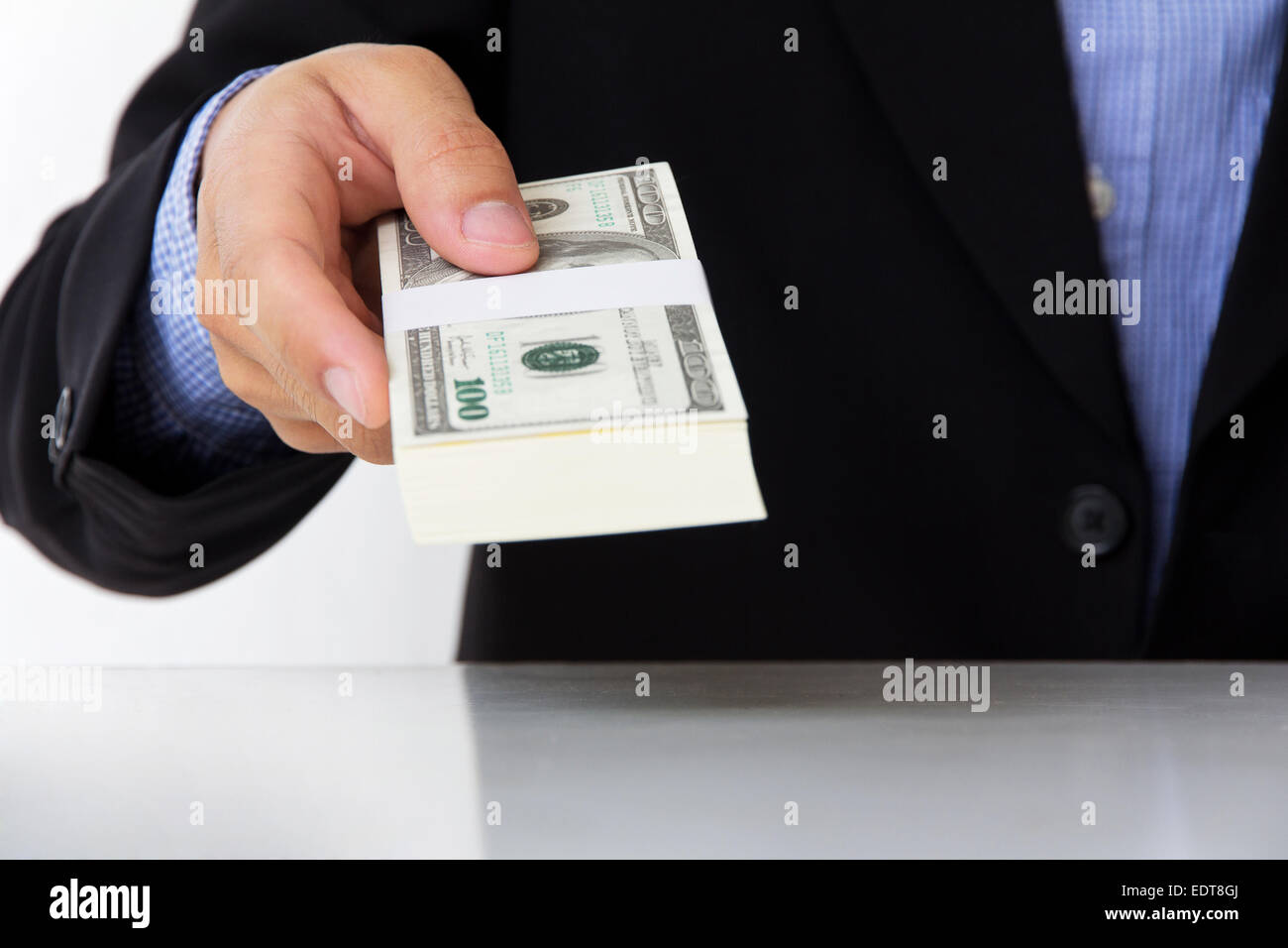 business man giving money Stock Photo - Alamy