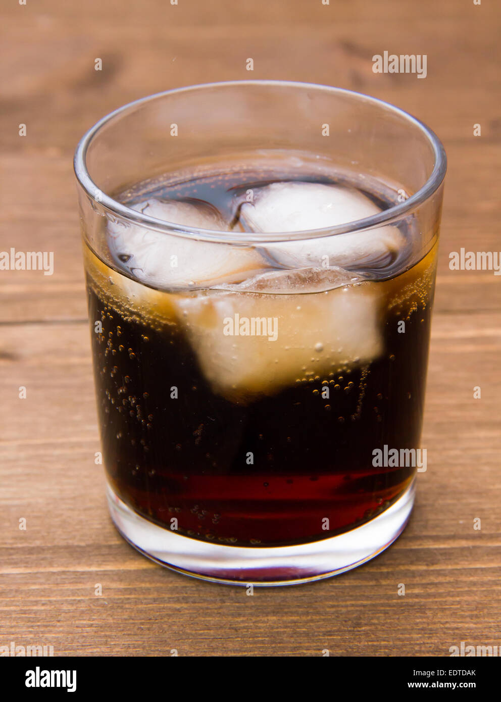Refreshing glass cola on ice hi-res stock photography and images - Alamy