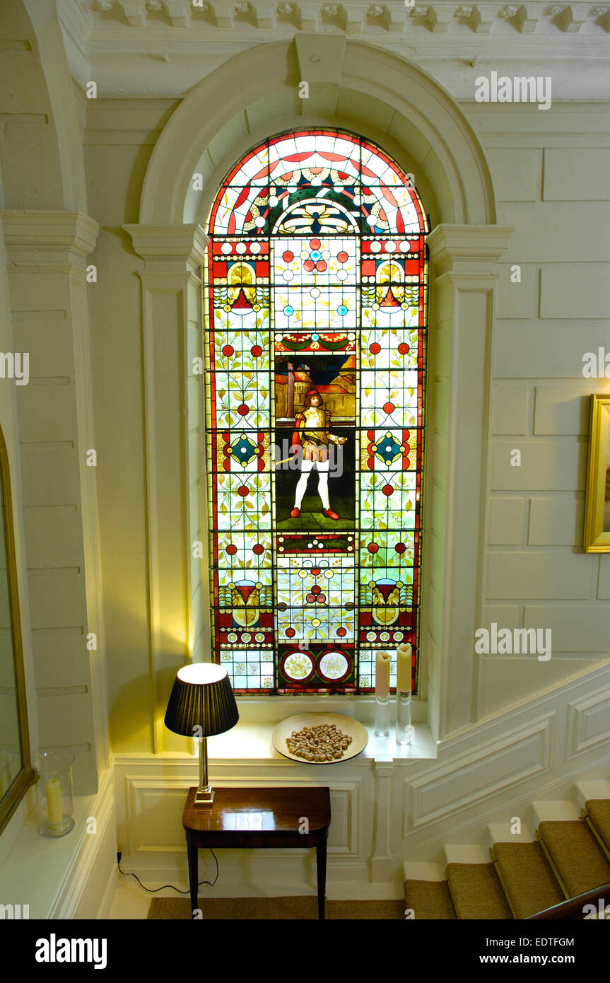 Large stained glass window on stairs, Eshott Hall, Northumberland, UK ...