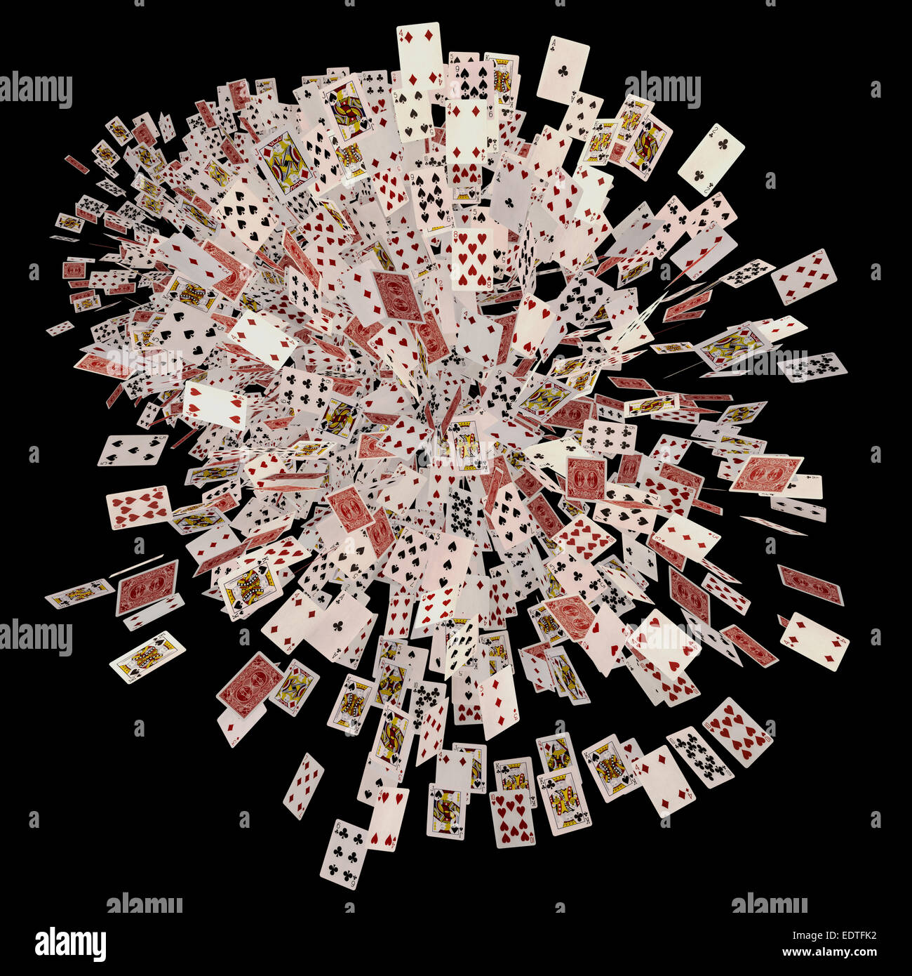 Playing cards flying over black background. Clipping path included ...