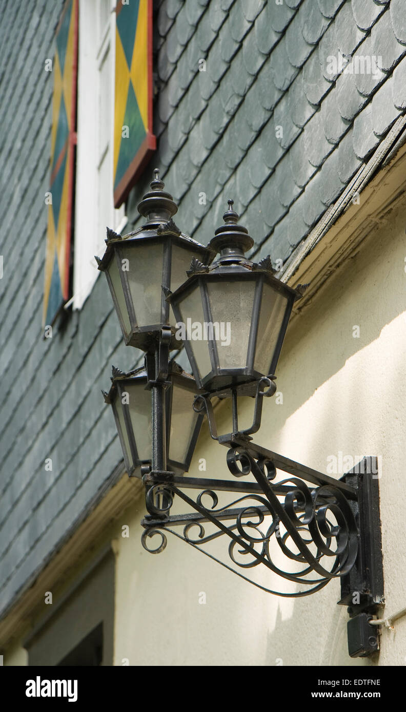 Three outdoor lamps on a wall in Goslar, Germany Stock Photo - Alamy